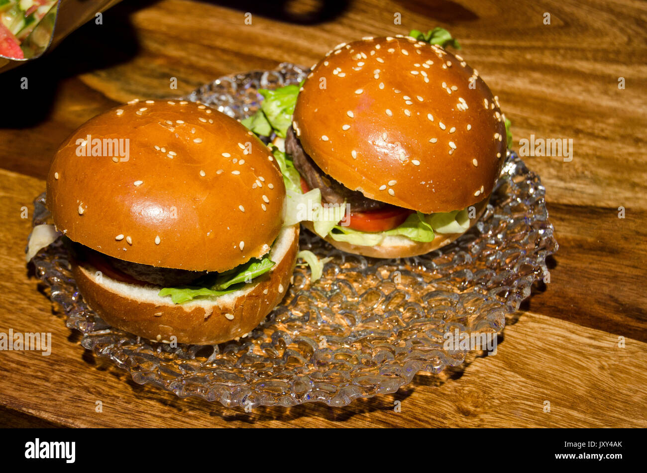 2 mini hamburgers on a platter Stock Photo - Alamy