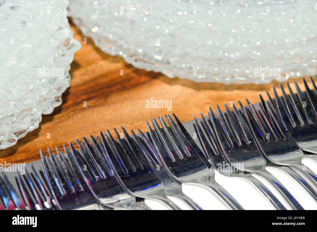 a large group of Forks on a buffet table Stock Photo - Alamy