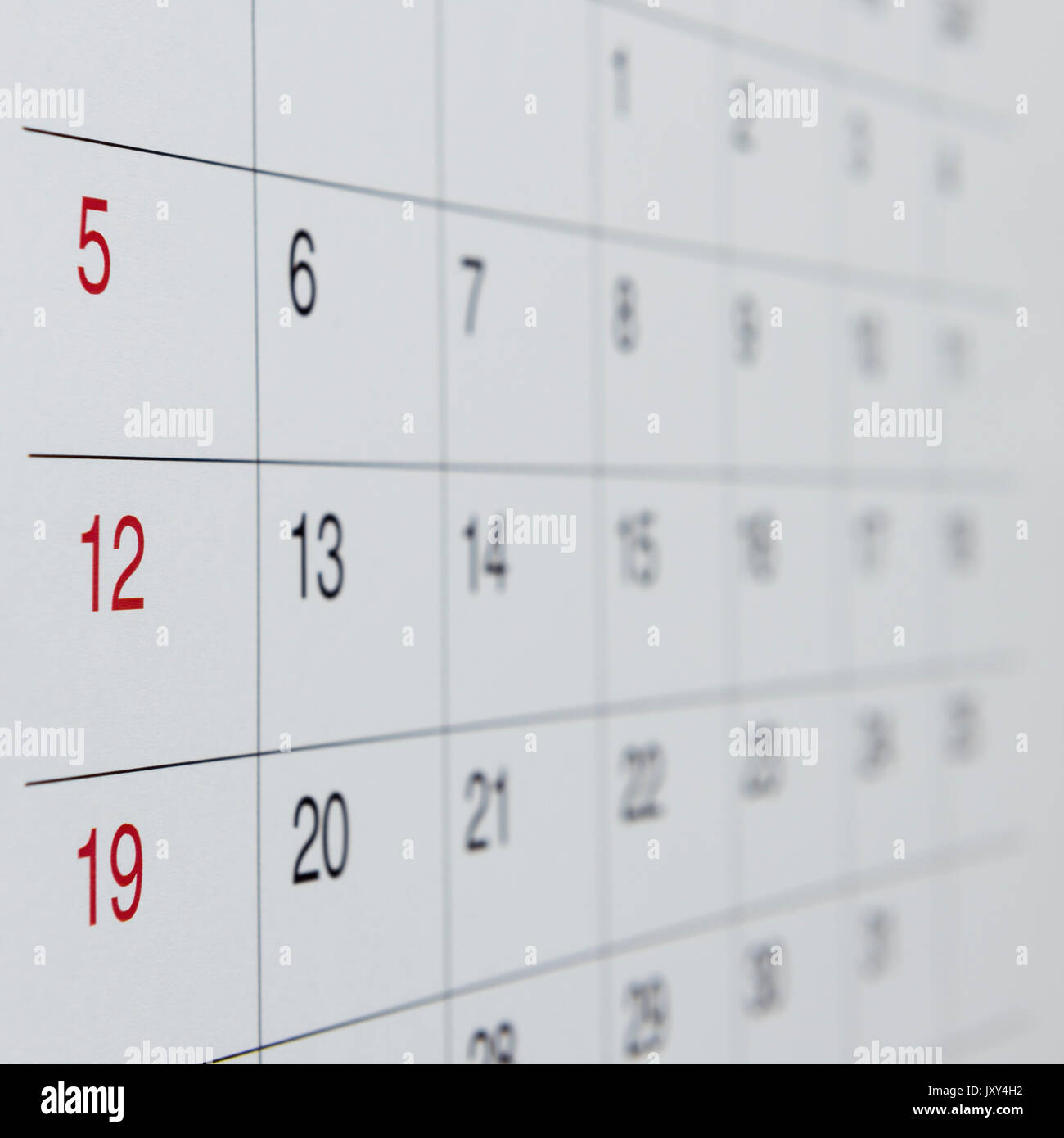 Closeup of numbers on calendar page Stock Photo - Alamy