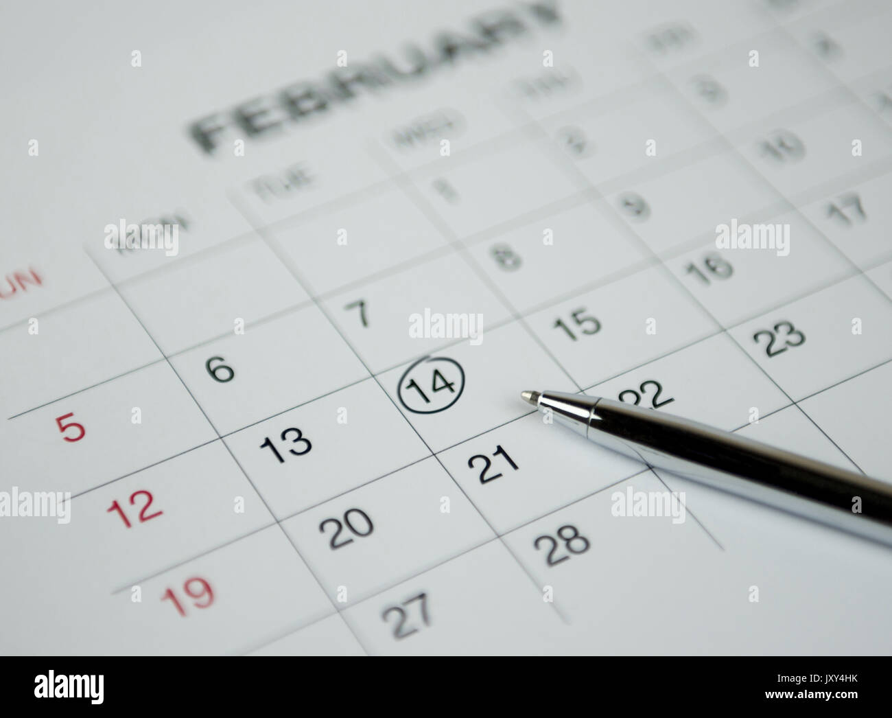 Closeup of numbers on calendar page Stock Photo - Alamy