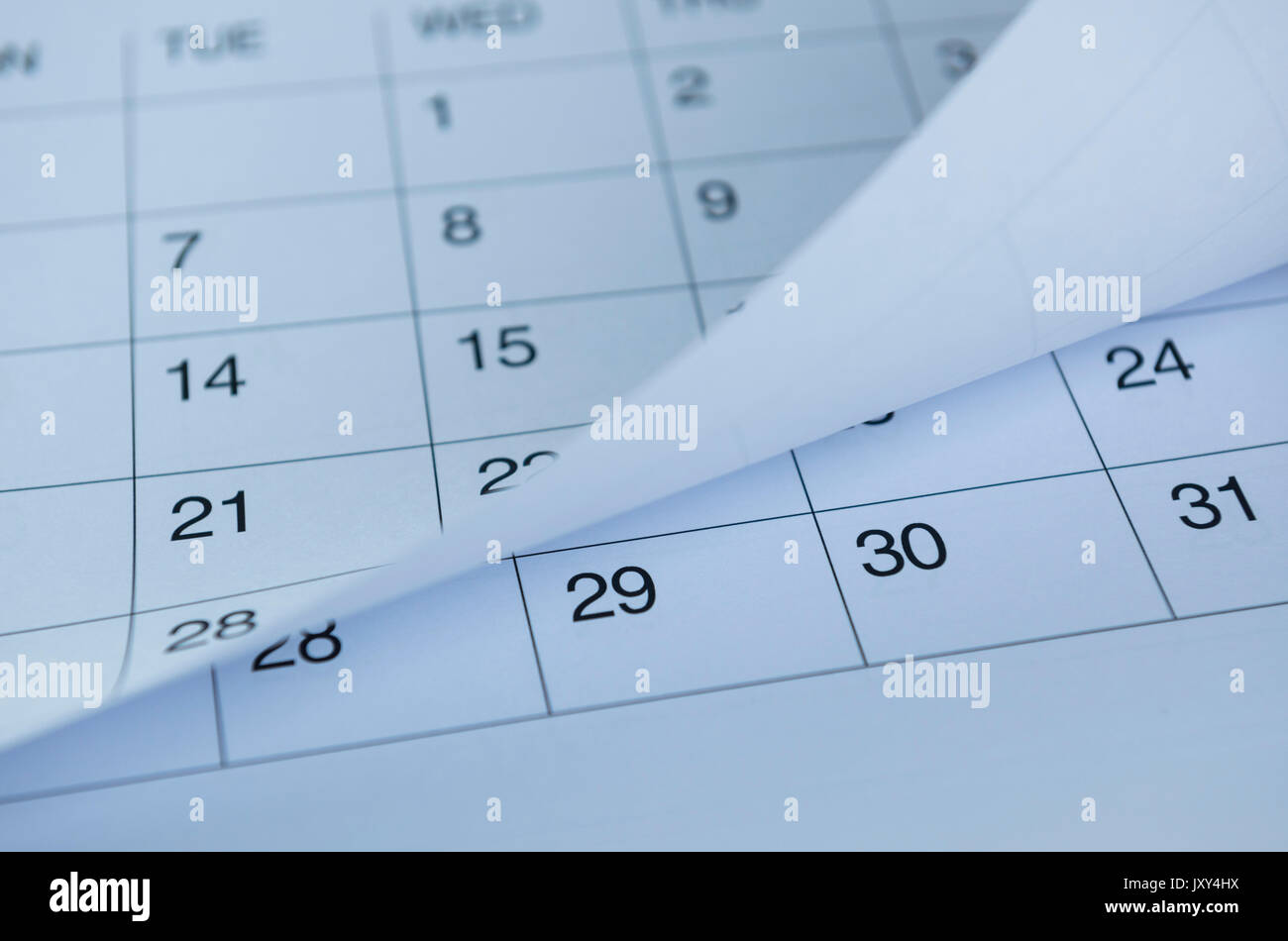 Closeup of numbers on calendar page Stock Photo - Alamy