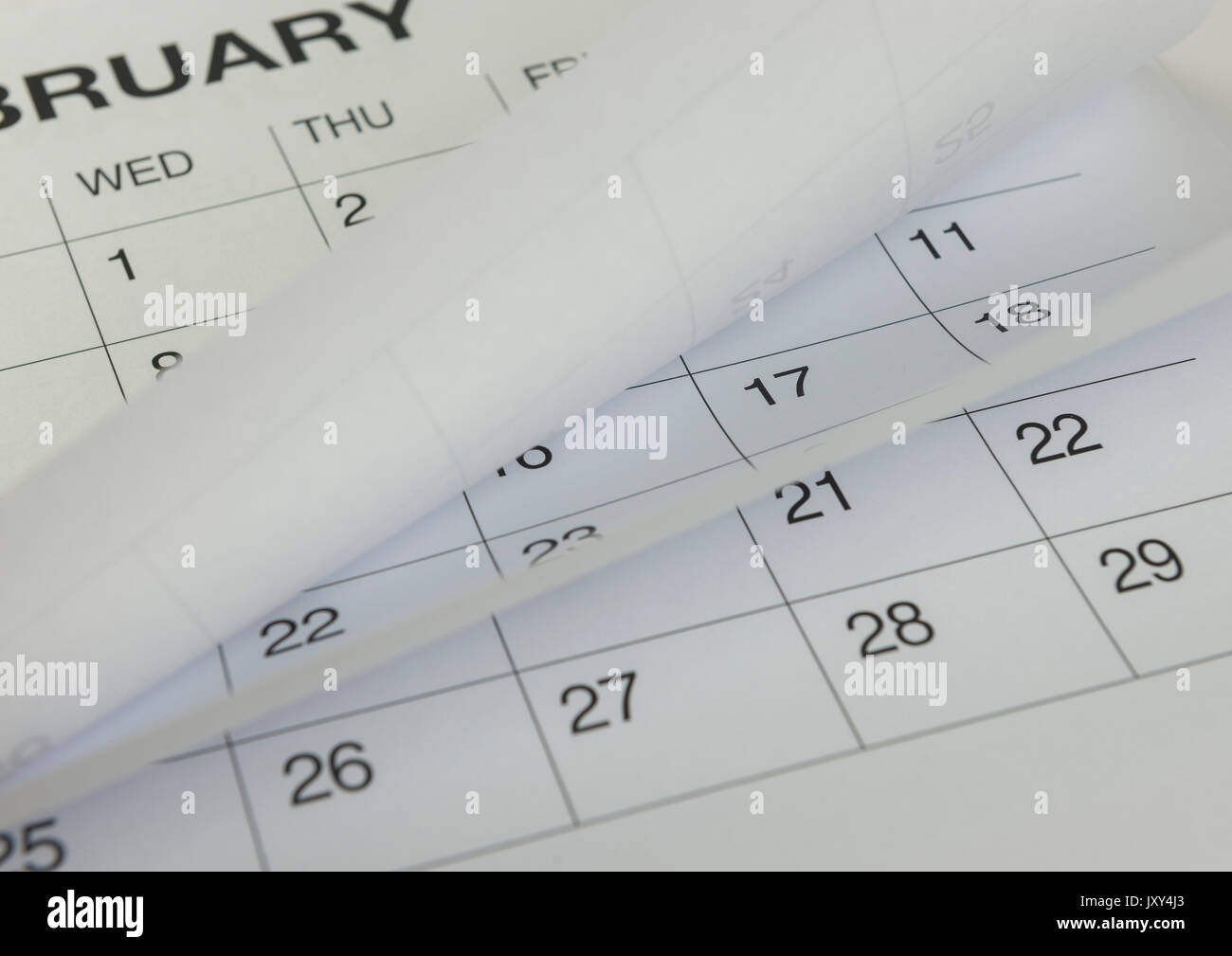 Closeup of numbers on calendar page Stock Photo - Alamy