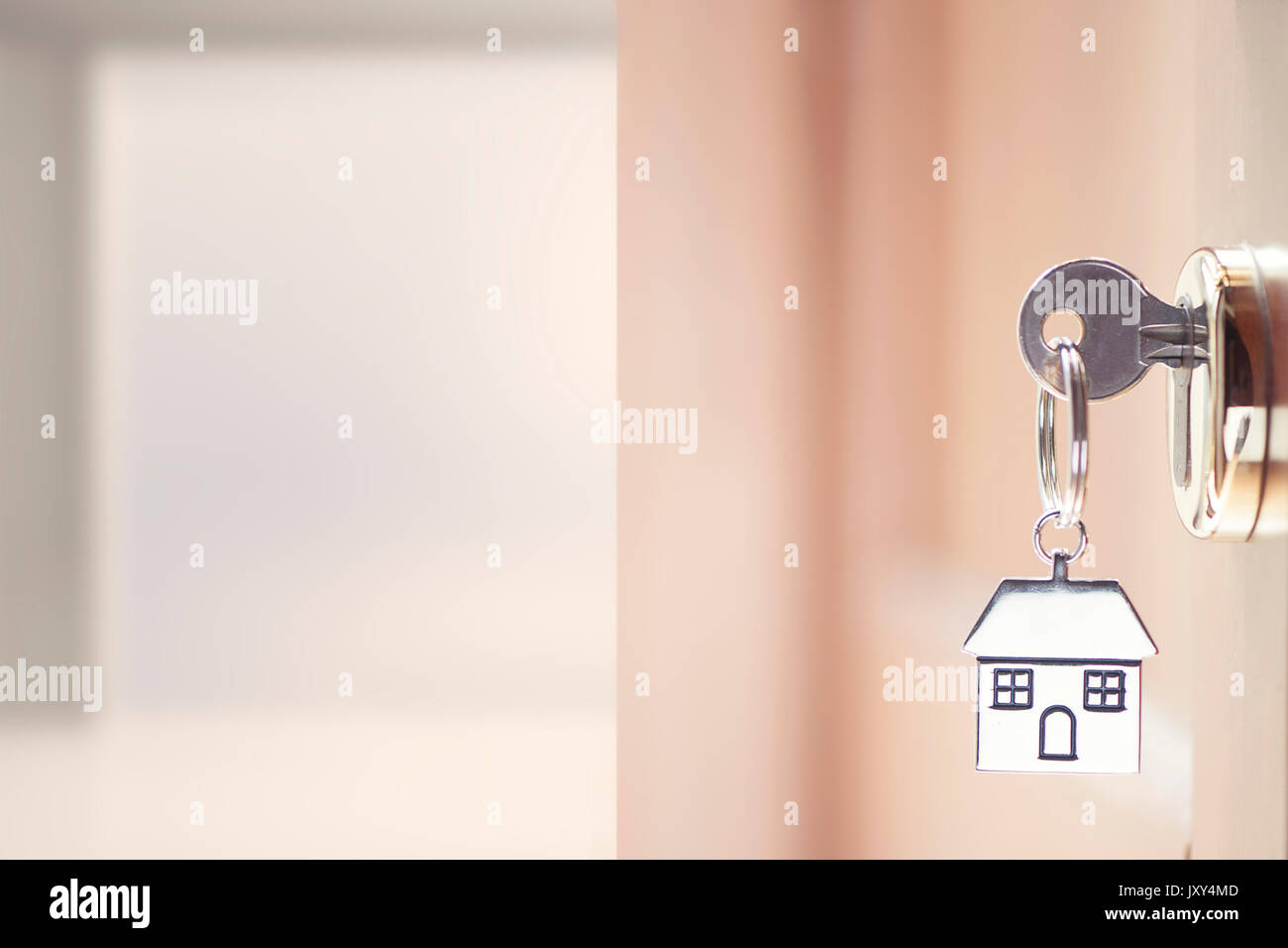 House key in the door Stock Photo - Alamy