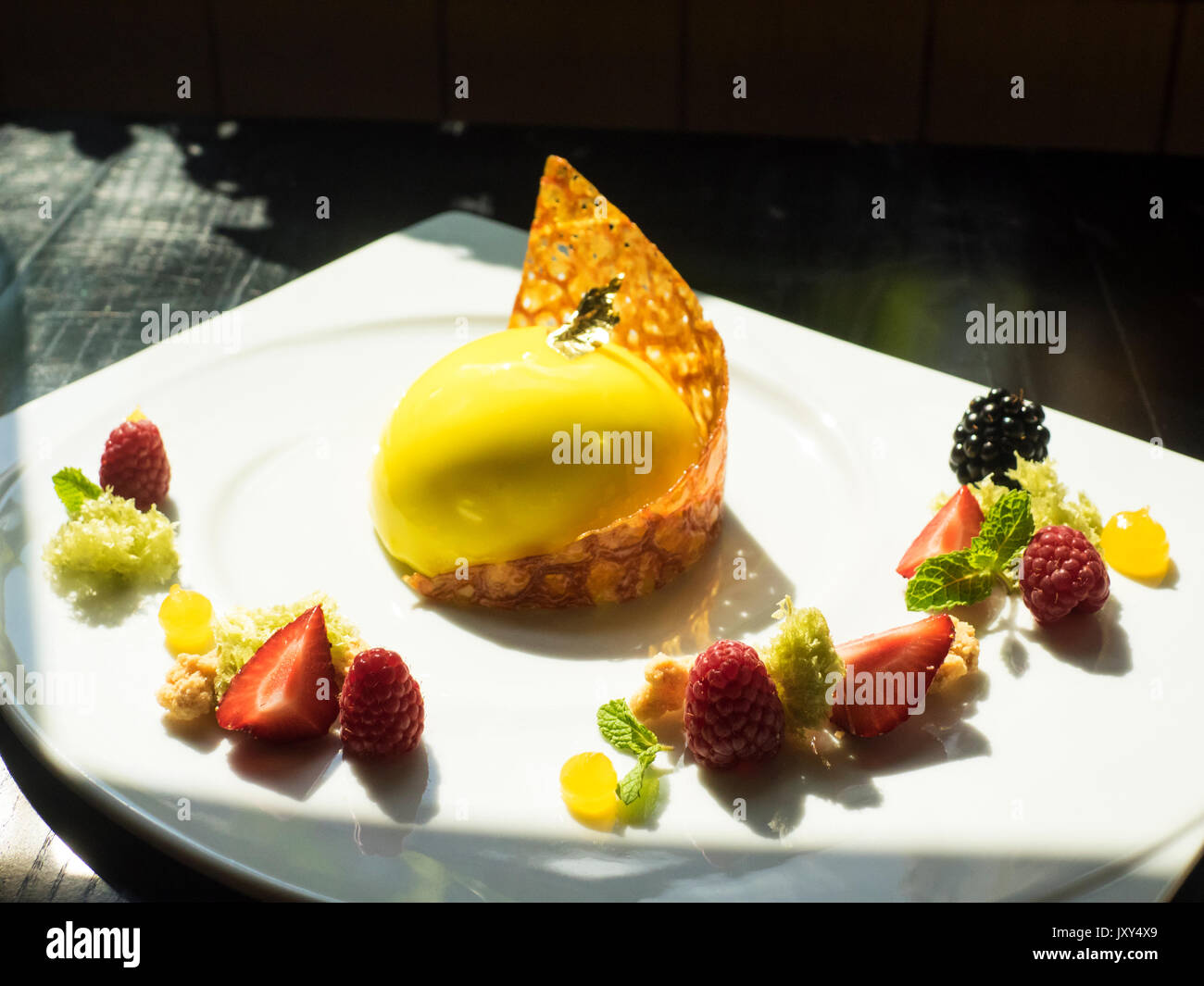 Mango parfait with passion fruit twill, and Apperol Shpritz Stock Photo ...
