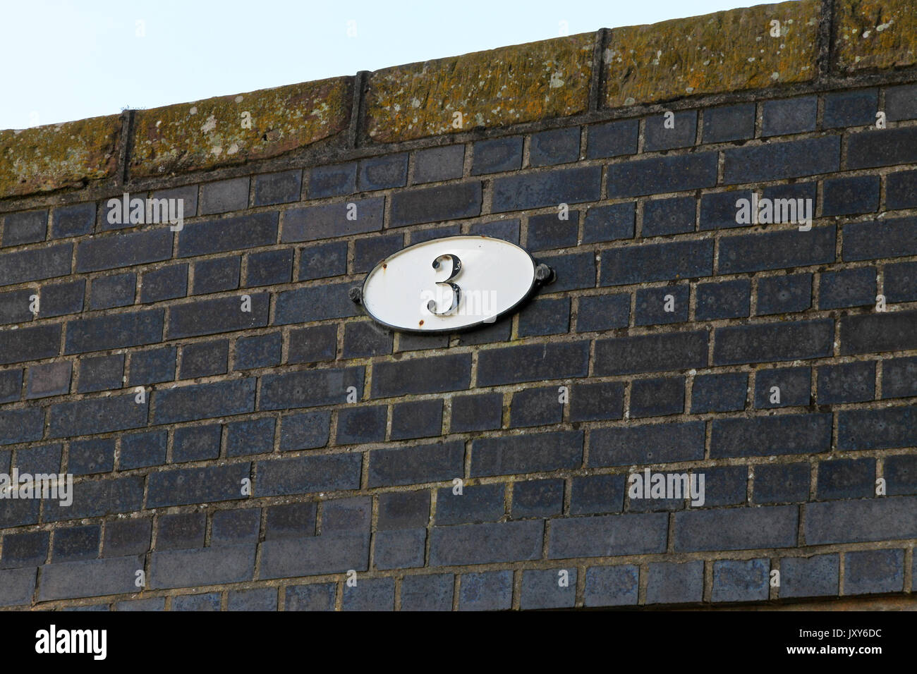 A number plate on a canal bridge saying number 3 Stock Photo - Alamy