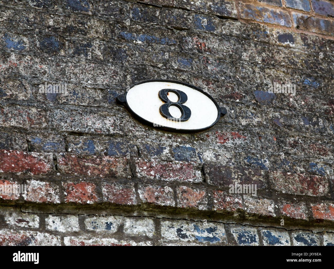 A number plate on a canal bridge saying number 8 Stock Photo - Alamy