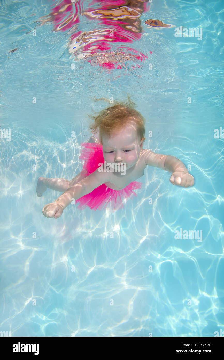 Pink infant hi-res stock photography and images - Alamy