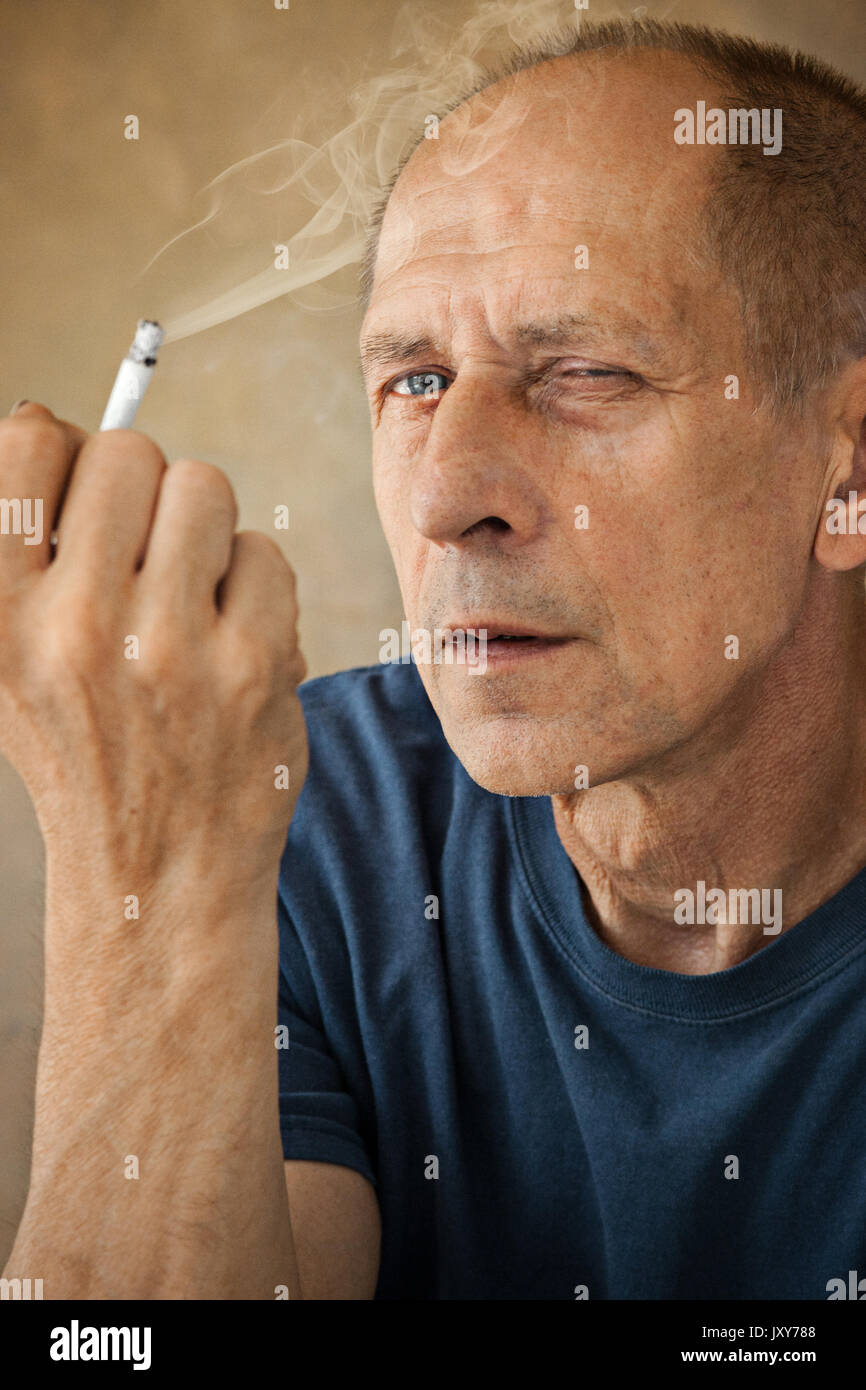 Sad man smoking caucasian hi-res stock photography and images - Alamy