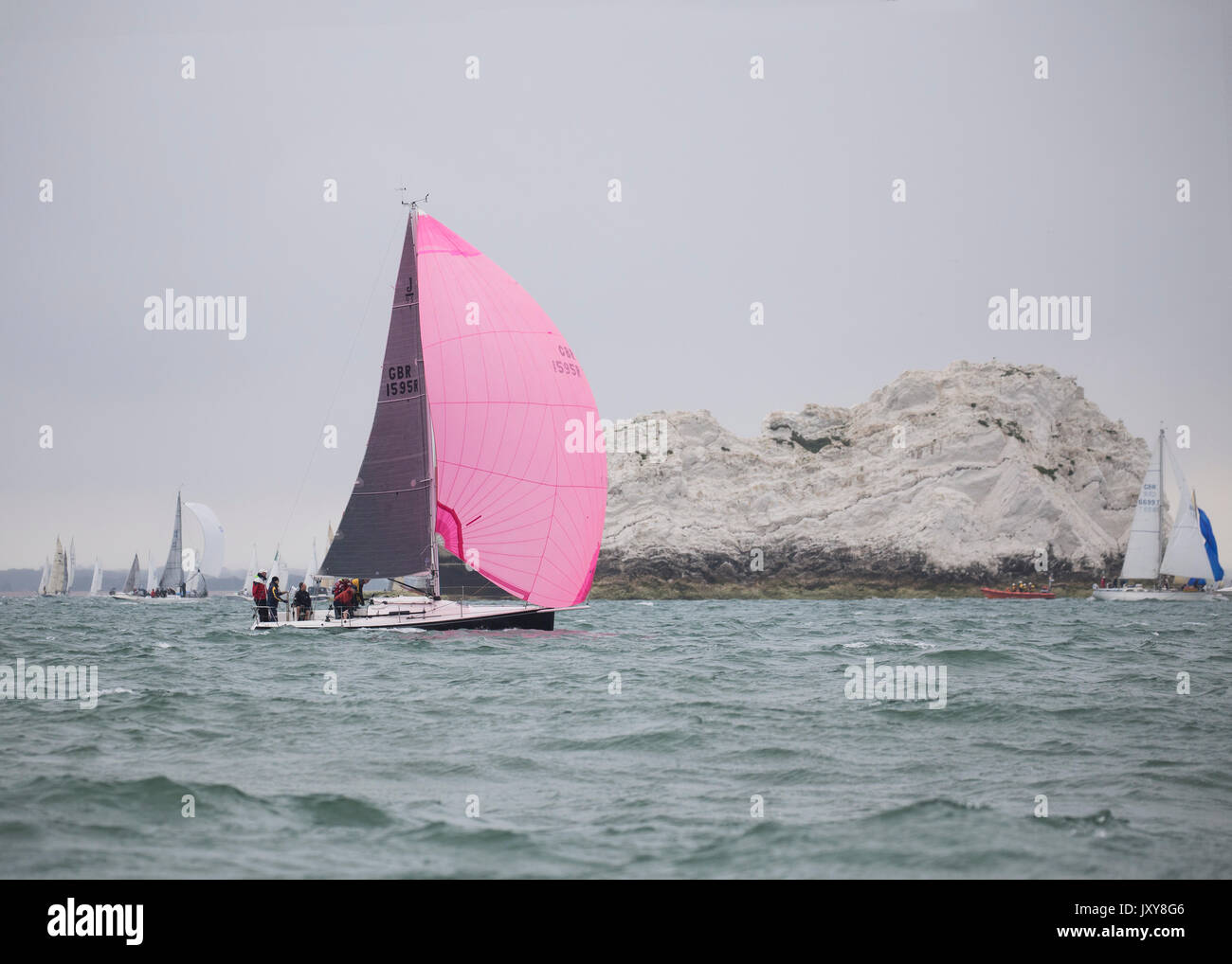 Yacht sailing needles lighthouse hi-res stock photography and images ...