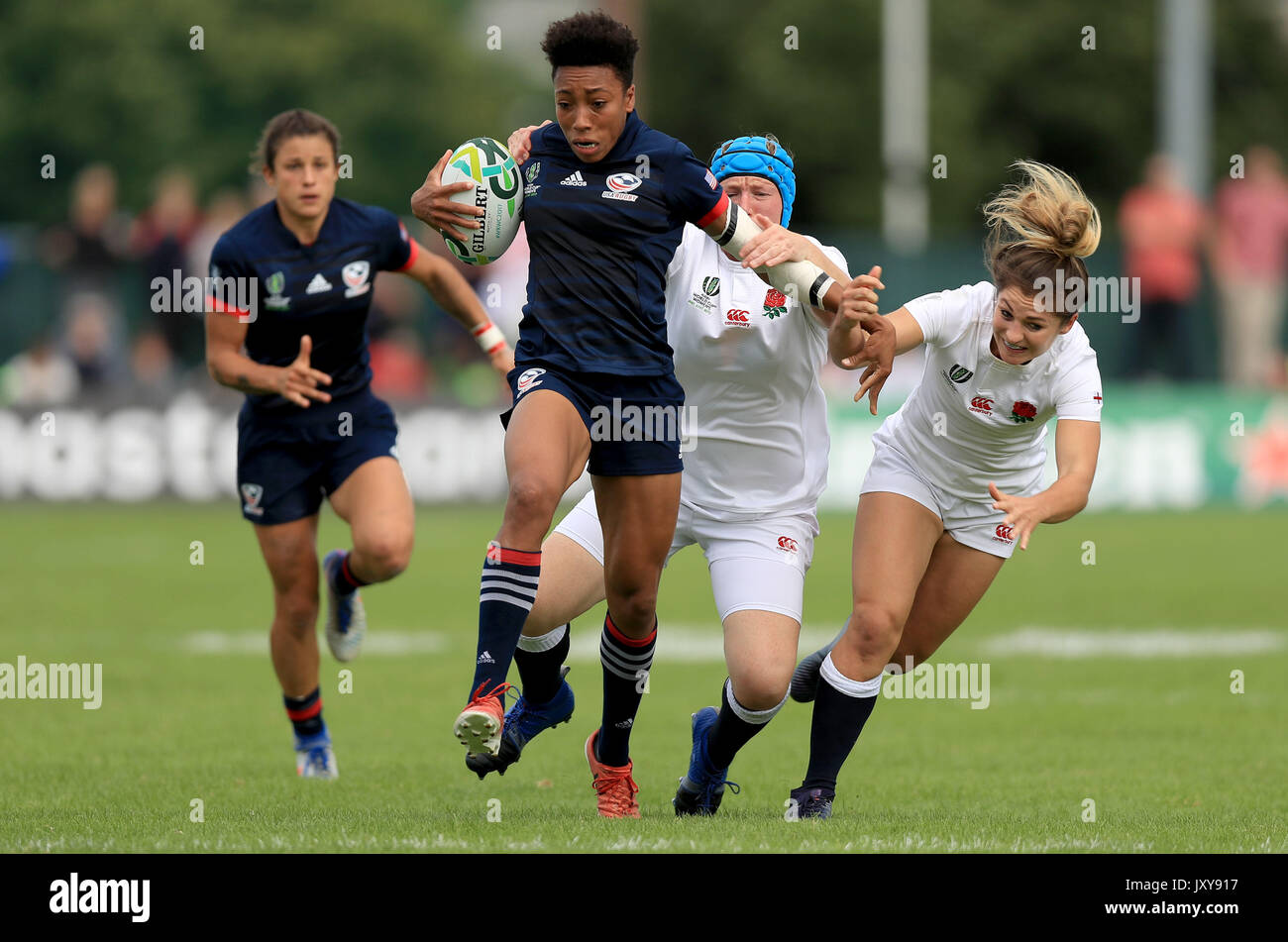 England's Vicky Fleetwood and Amy Wilson-Hardy tackle USA's Kris Thomas ...