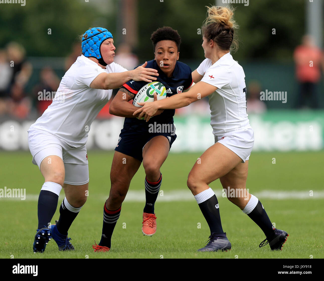 England's Vicky Fleetwood and Amy Wilson-Hardy tackle USA's Kris Thomas ...