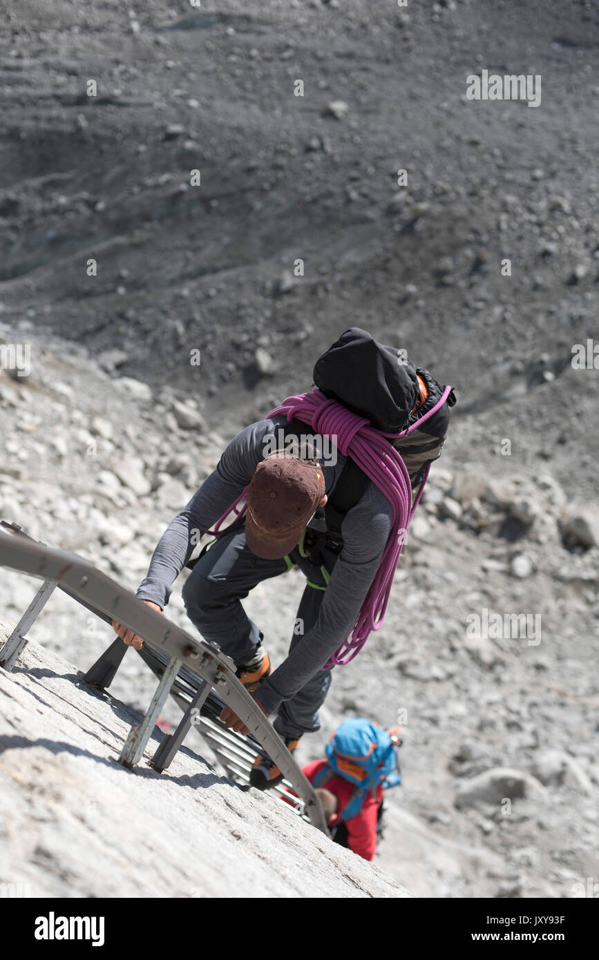 Ladder climbers hi-res stock photography and images - Alamy