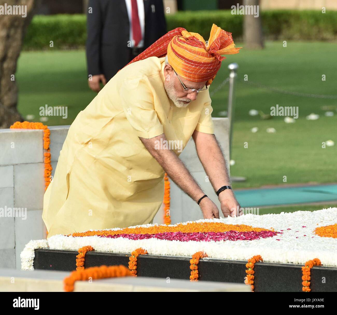 Indian Prime Minister Narendra Modi places flower petals on the Samadhi ...