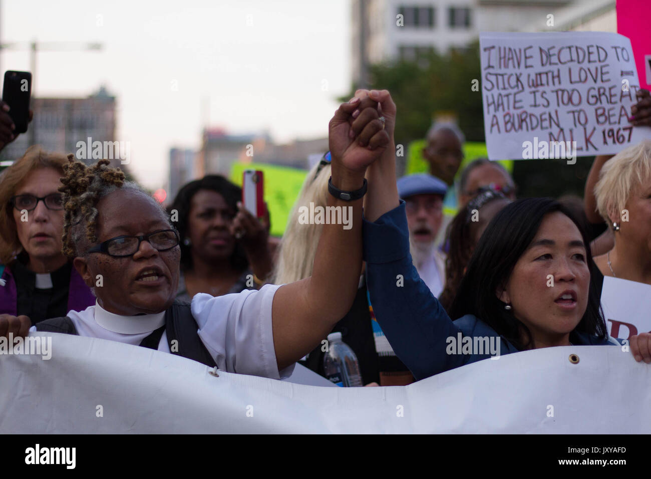 Philadelphia City Councilwoman-at-Large Helen Gym (R) holds hands with ...