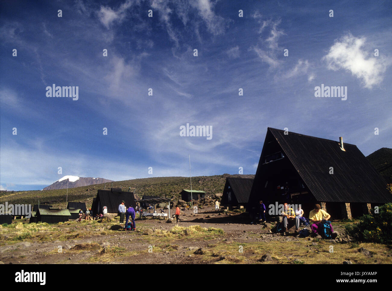Tourists relaxing at Horombo Huts, Mount Kilimanjaro the highest point ...