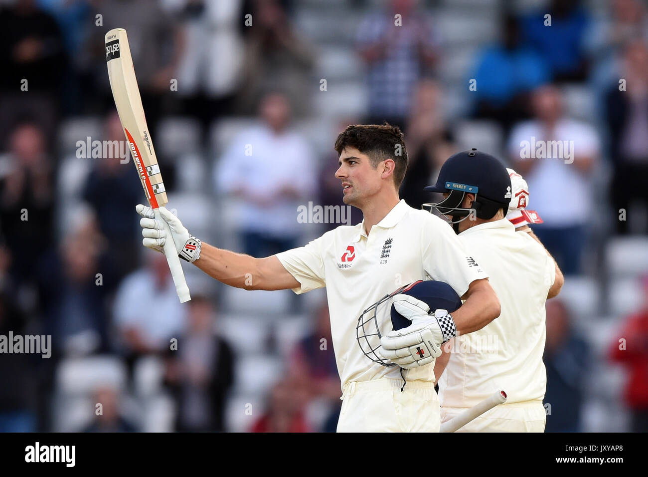 England's Alastair Cook celebrates his century during day one of the ...