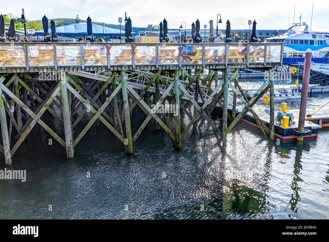 Bar Harbor, USA - June 8, 2017: Underneath wooden deck dock and ...