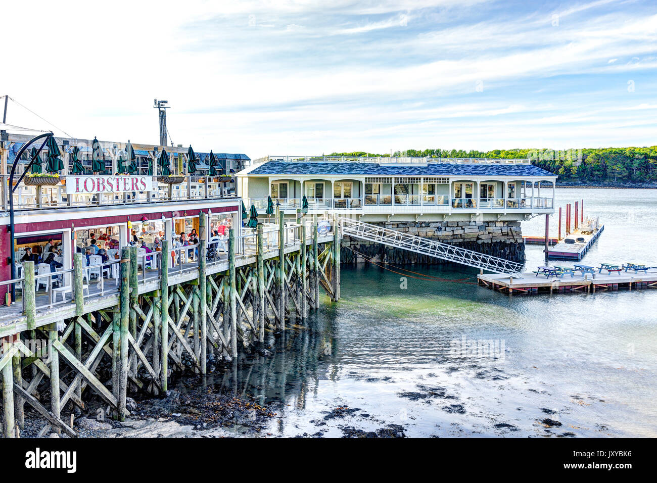 Bar Harbor, USA - June 8, 2017: Wooden deck dock and waterfront lobster ...