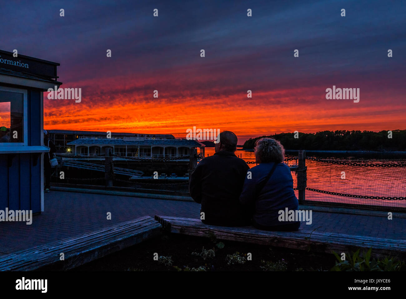 Bar Harbor, USA - June 8, 2017: Couple sitting in downtown village in ...