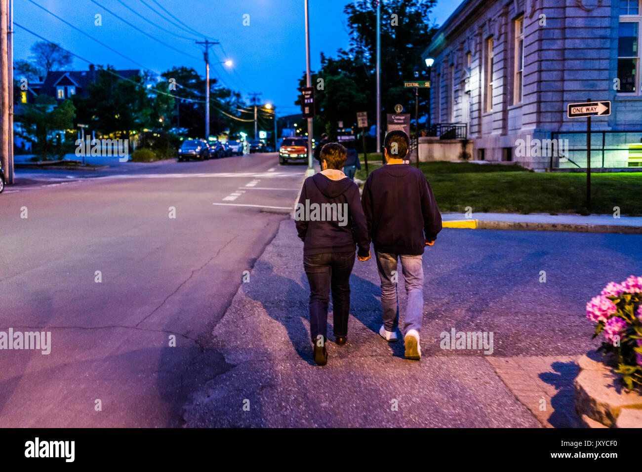 Bar Harbor, USA - June 8, 2017: Couple walking on street in downtown ...
