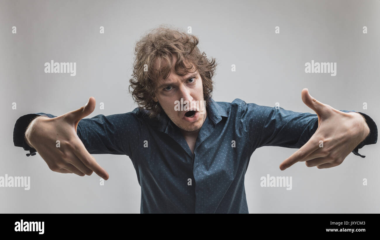 angry man trying to intimidate you with a gross menace with both his ...