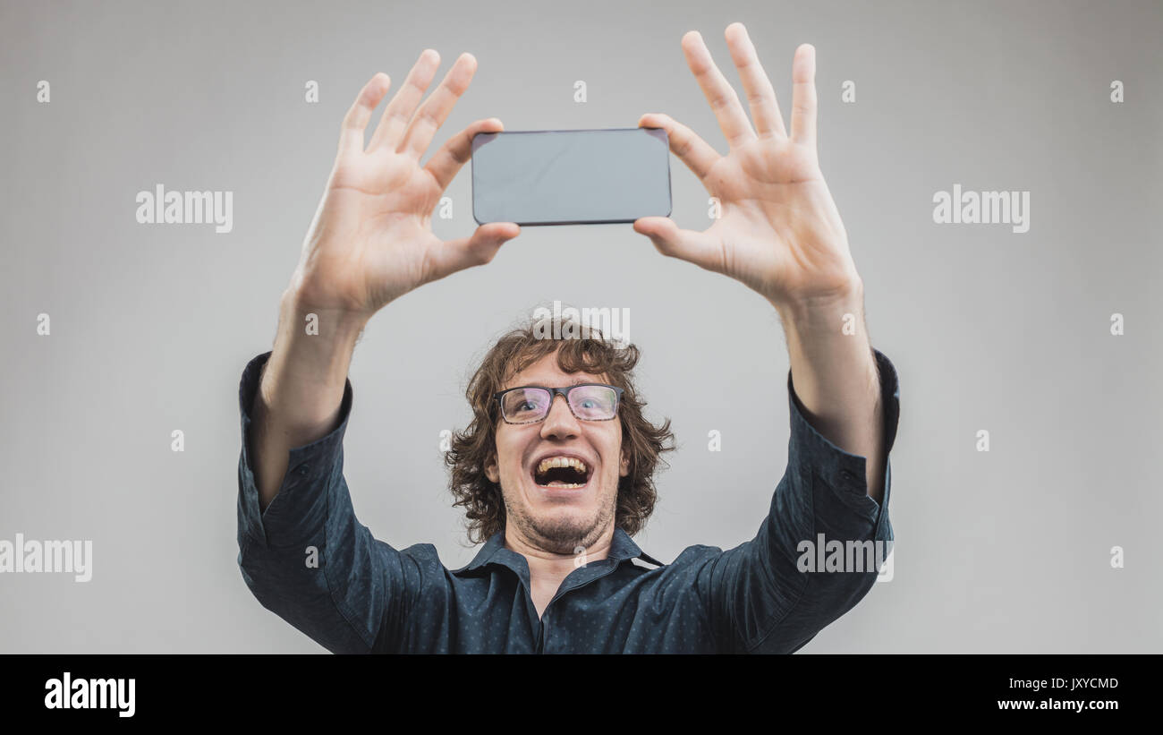 Exaggerated smile hi-res stock photography and images - Alamy