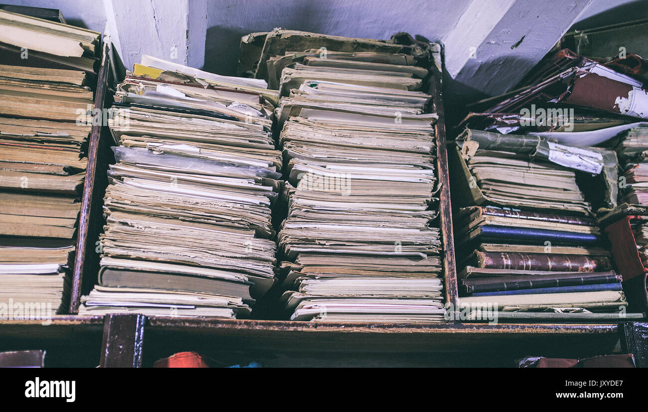 Group of old papers in a library Stock Photo - Alamy