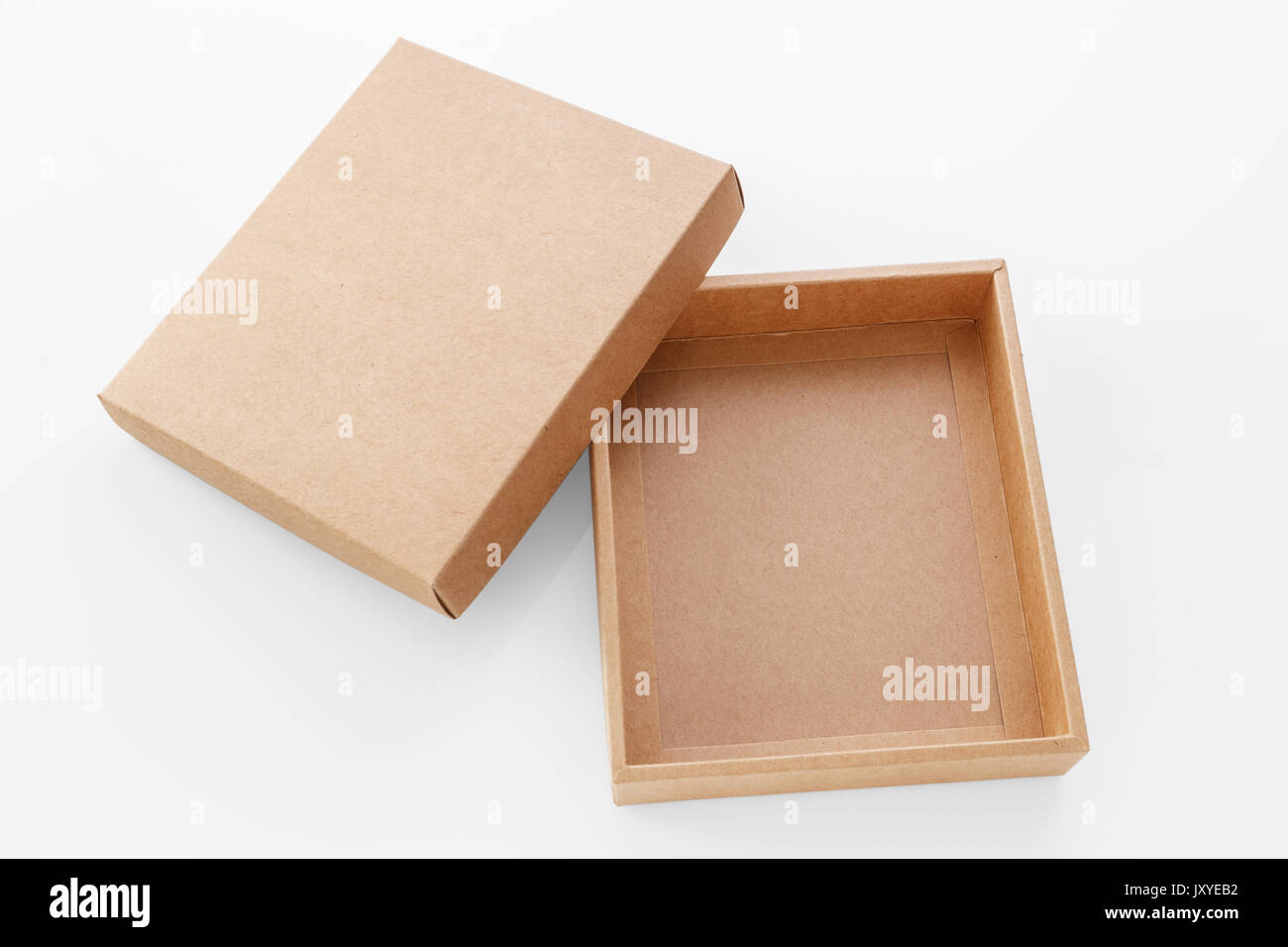 Craft paper box with lid on white background Stock Photo - Alamy