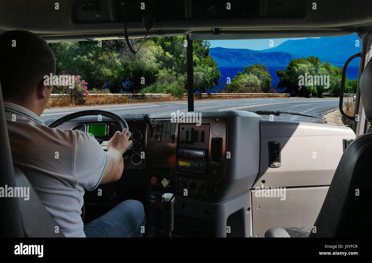 The truck driver on the road among fields highway. business trip Stock ...