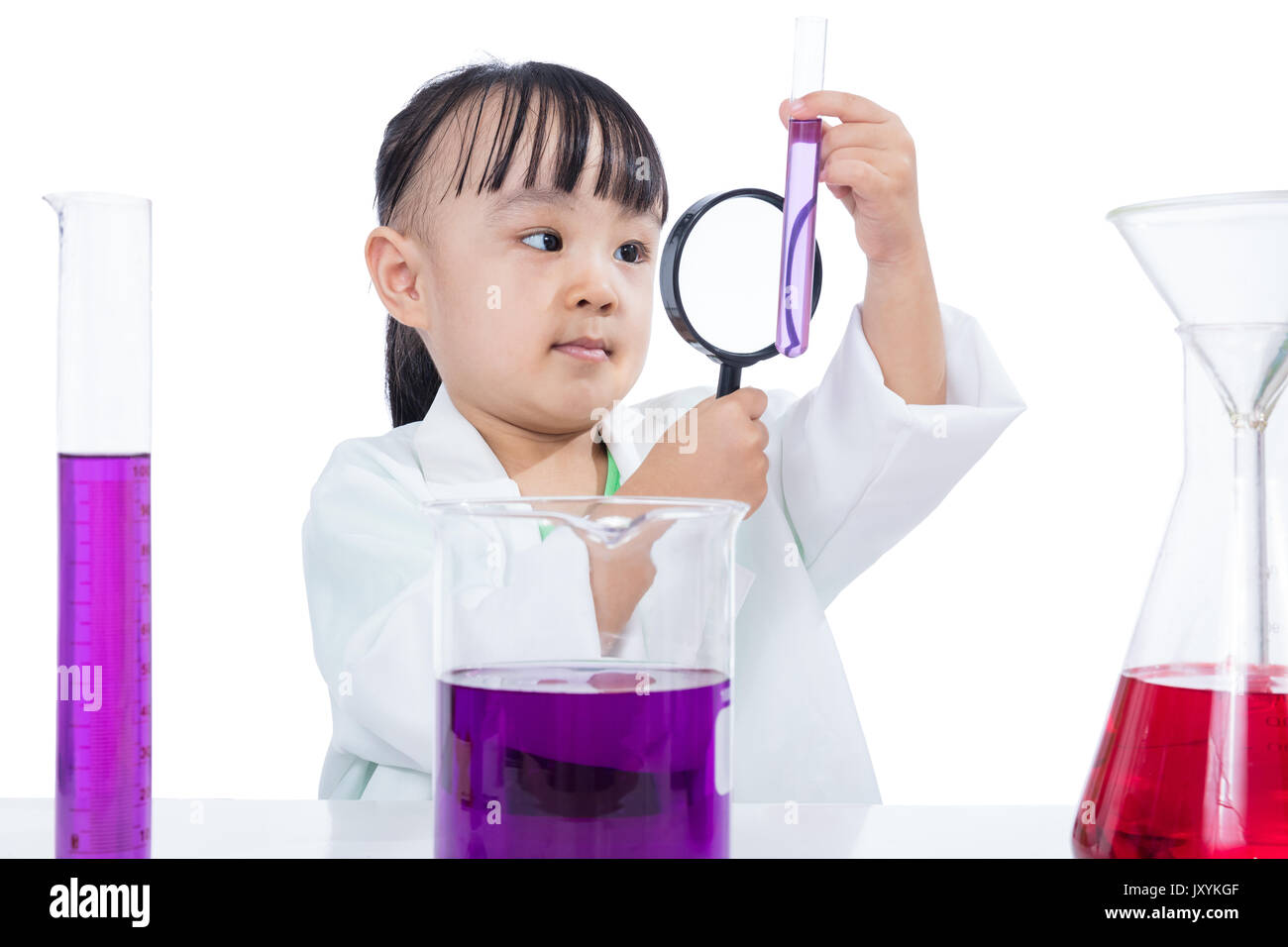 Asian Chinese little girl working with test tube in isolated white ...