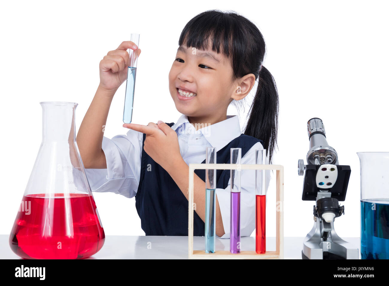 Asian Chinese little girl working with test tube in isolated white ...