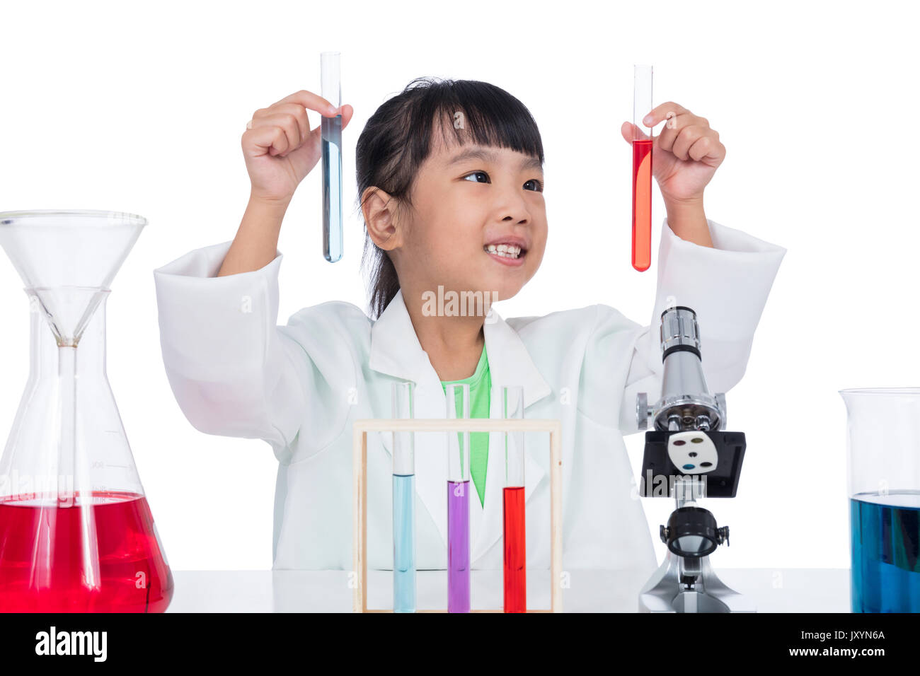 Asian Chinese little girl working with test tube in isolated white ...