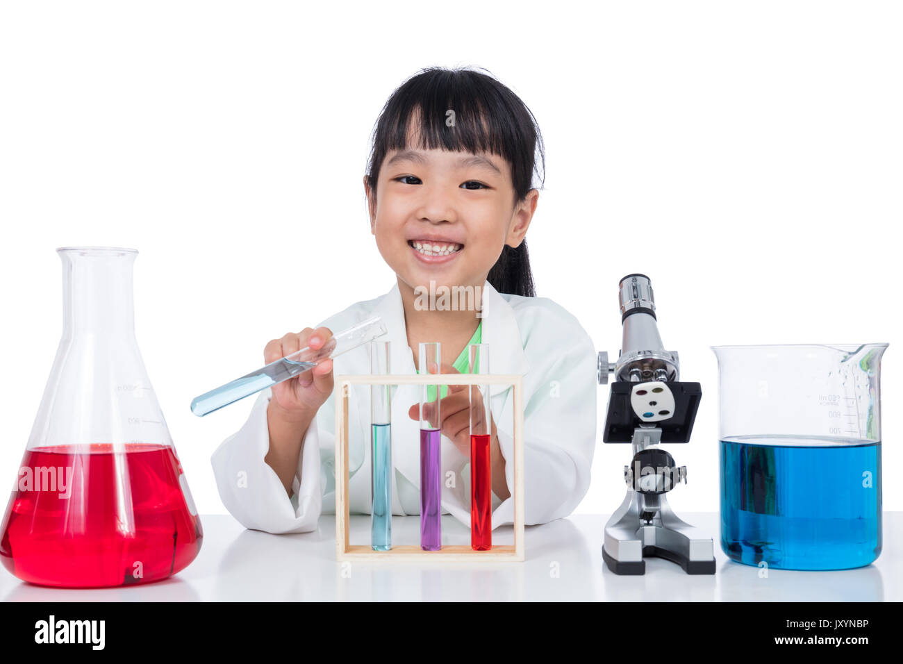 Asian Chinese little girl working with test tube in isolated white ...