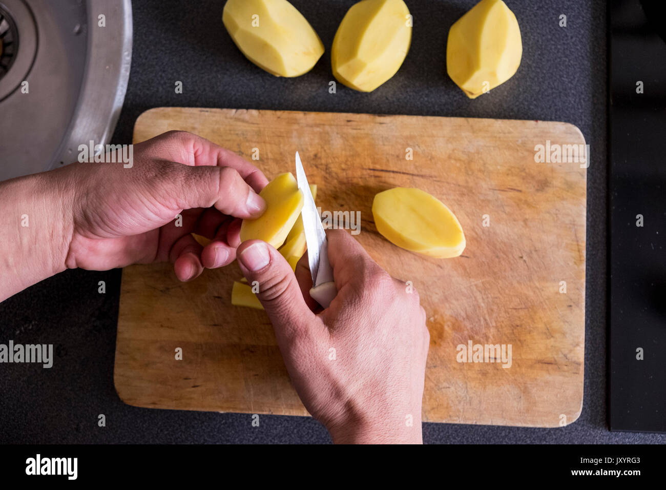 Hand one potato hi-res stock photography and images - Alamy