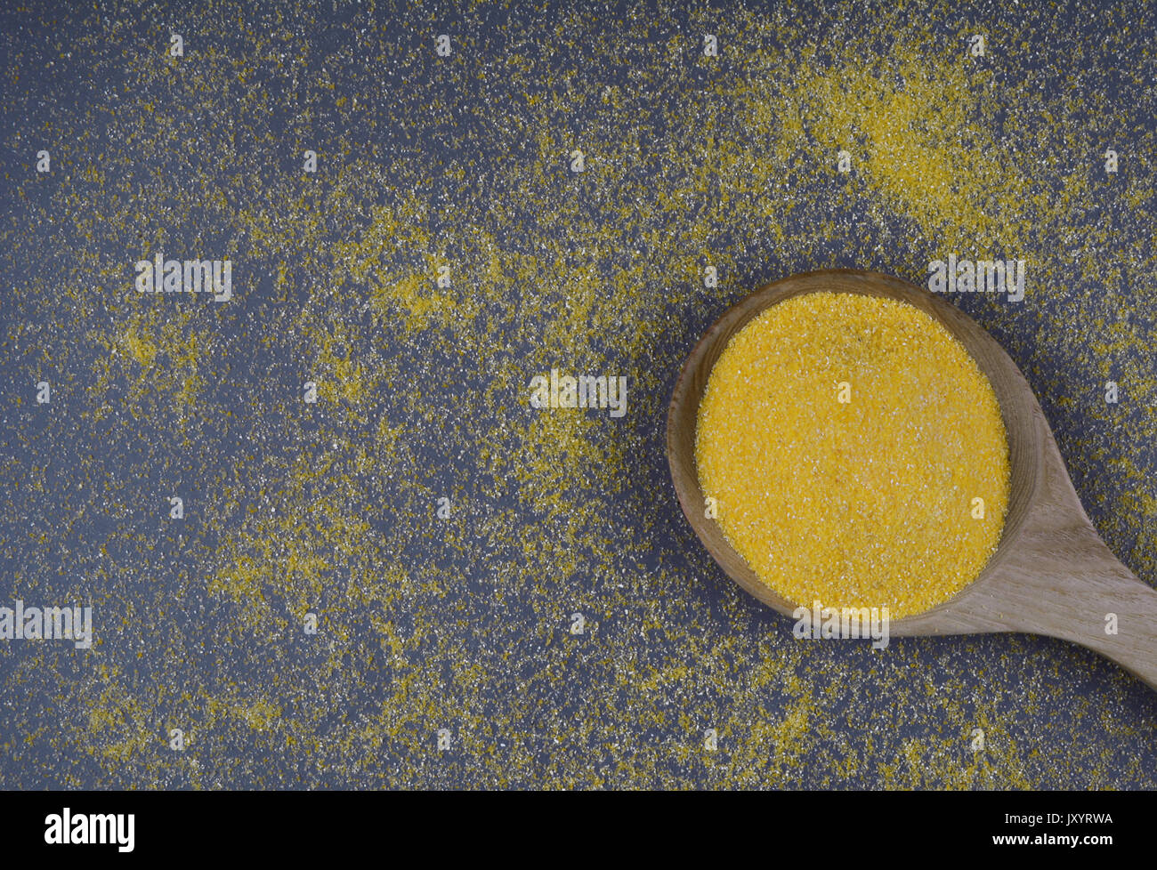 Corn meal of dry polenta on dark background. Flat lay style Stock Photo ...