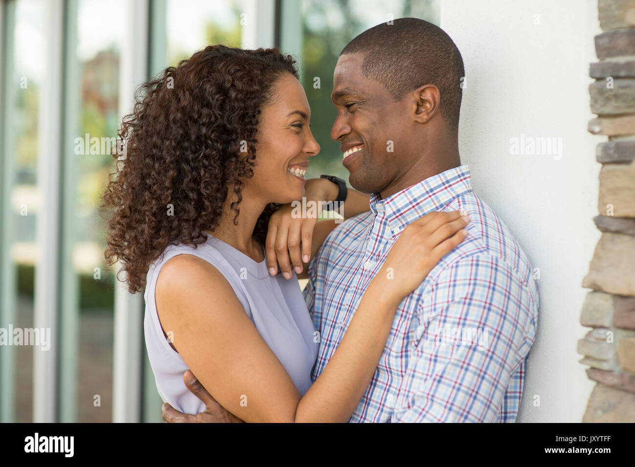 Hugging wall hi-res stock photography and images - Alamy