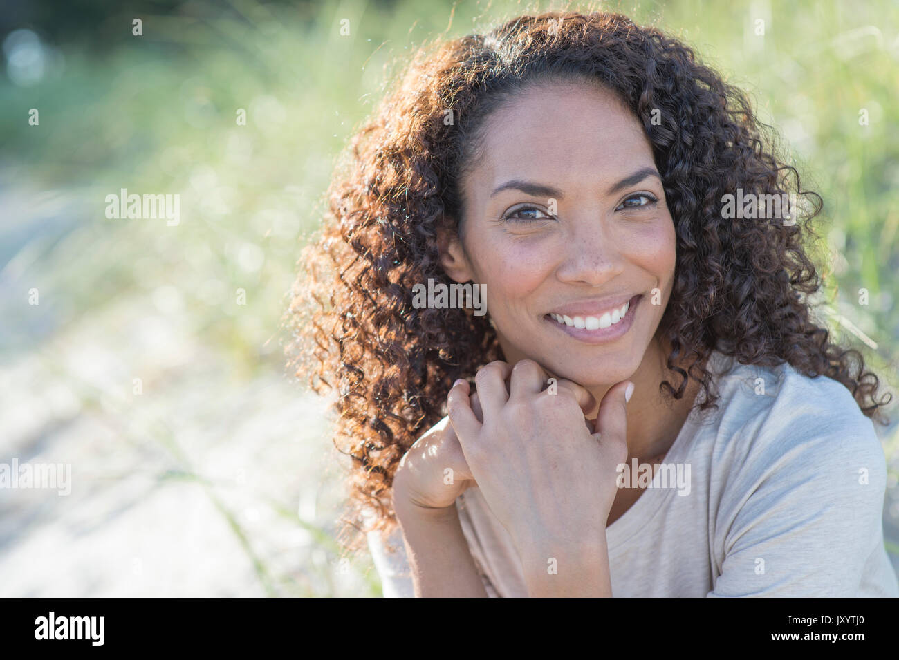 Portrait of smiling Mixed Race woman at beach Stock Photo - Alamy Portrait of smiling Mixed Race woman at beach Stock Photo - Alamy