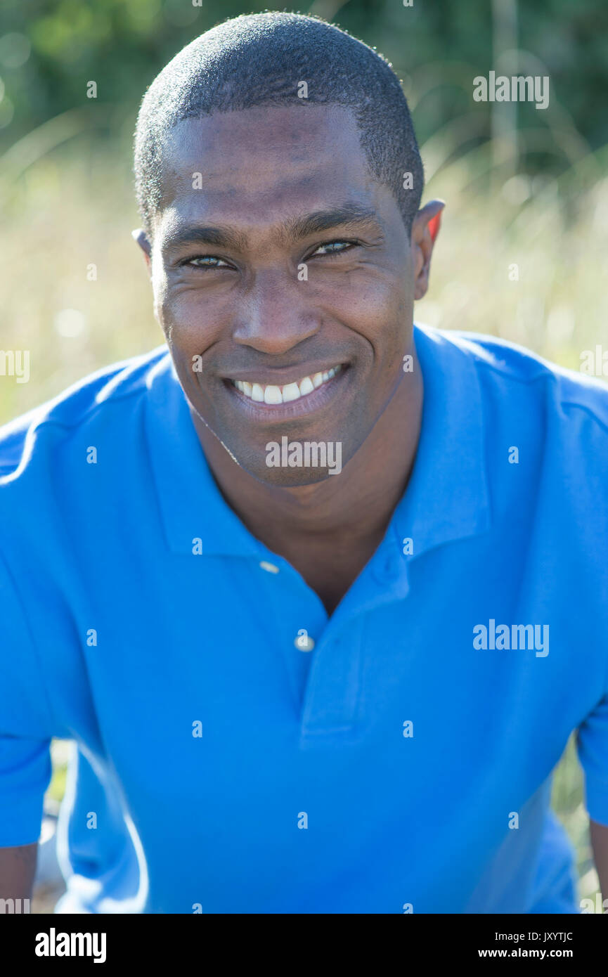Portrait of smiling Black man Stock Photo - Alamy