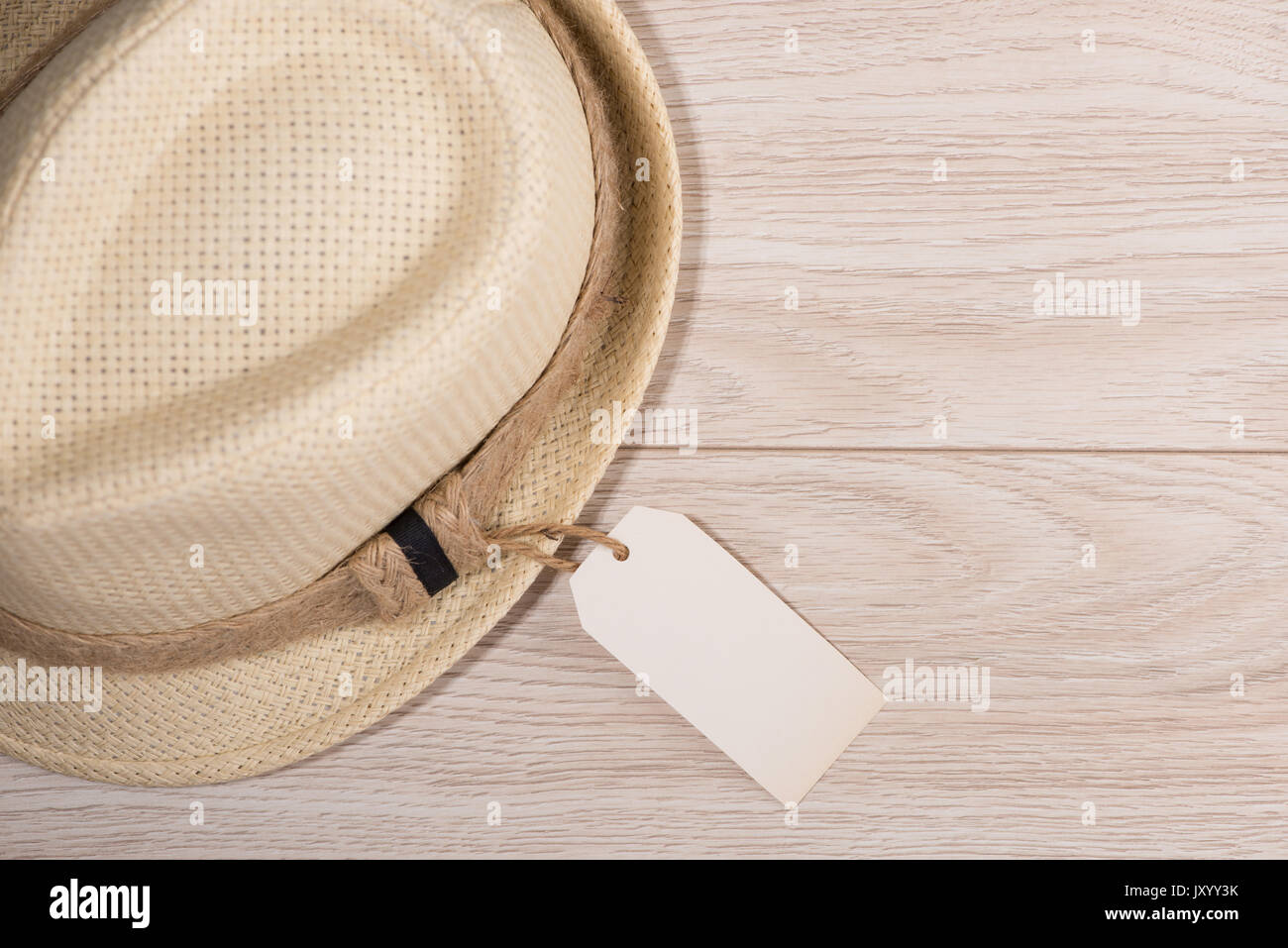 Accessory price tag. Rectangular tag is attached to a hat Stock Photo ...