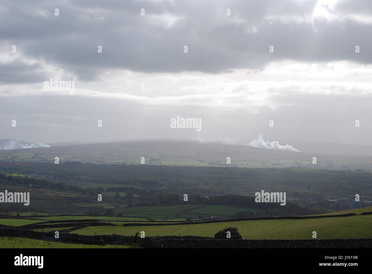 Smoke on the horizon Stock Photo - Alamy