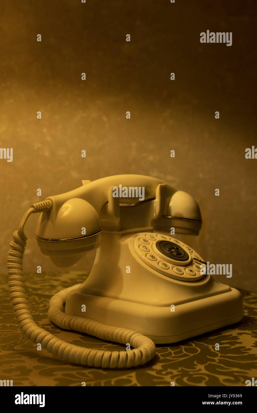 Classic push button desk telephone in retro style Stock Photo - Alamy