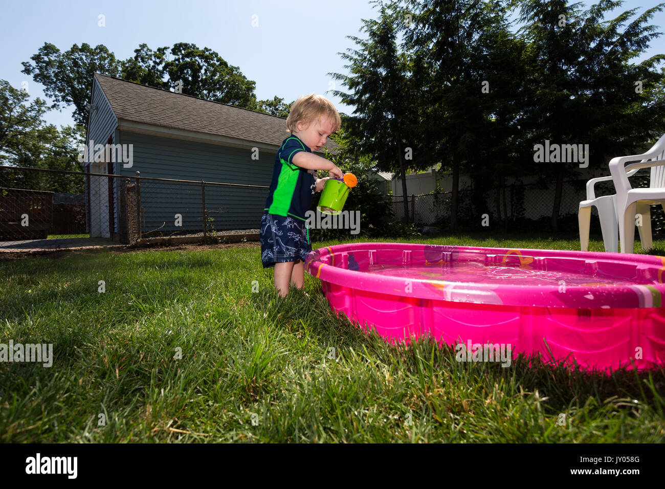 Backyard pool kids hi-res stock photography and images - Alamy