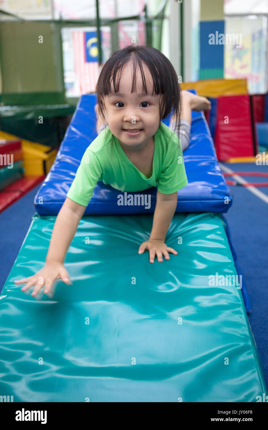 Asian Chinese little girl playing at indoor playground Stock Photo - Alamy