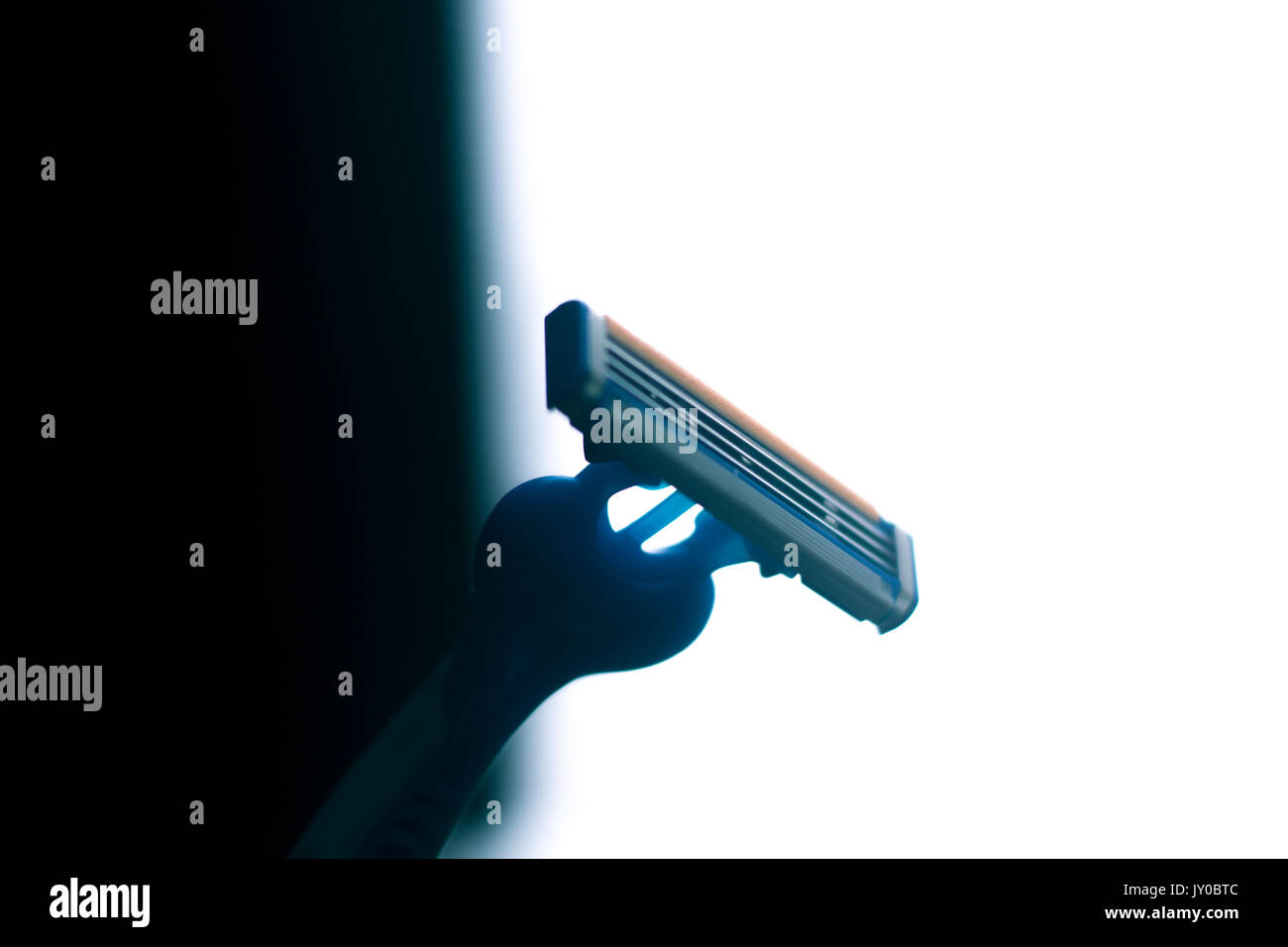 Modern safety disposable plastic shaving razor with multiple blades and ...