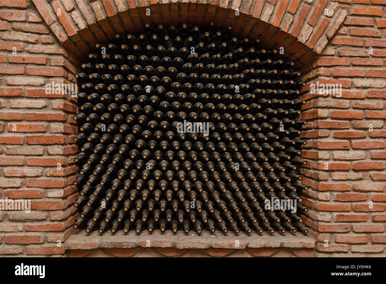 Stacked up wine bottles in the cellar,old wine cellars with bottles and ...
