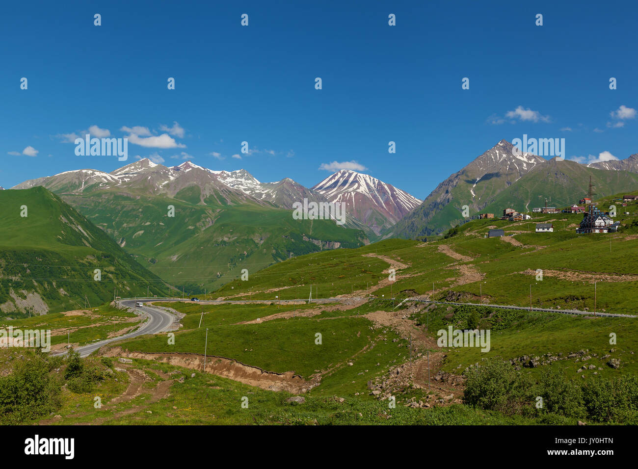 Mountain road through a mountain pass, Kazbegi and military Georgian ...