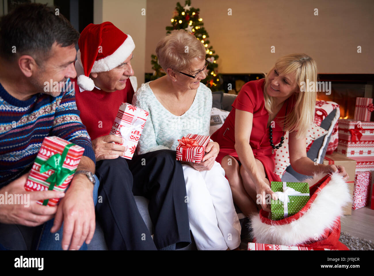 Mother in the role of Santa Claus Stock Photo - Alamy