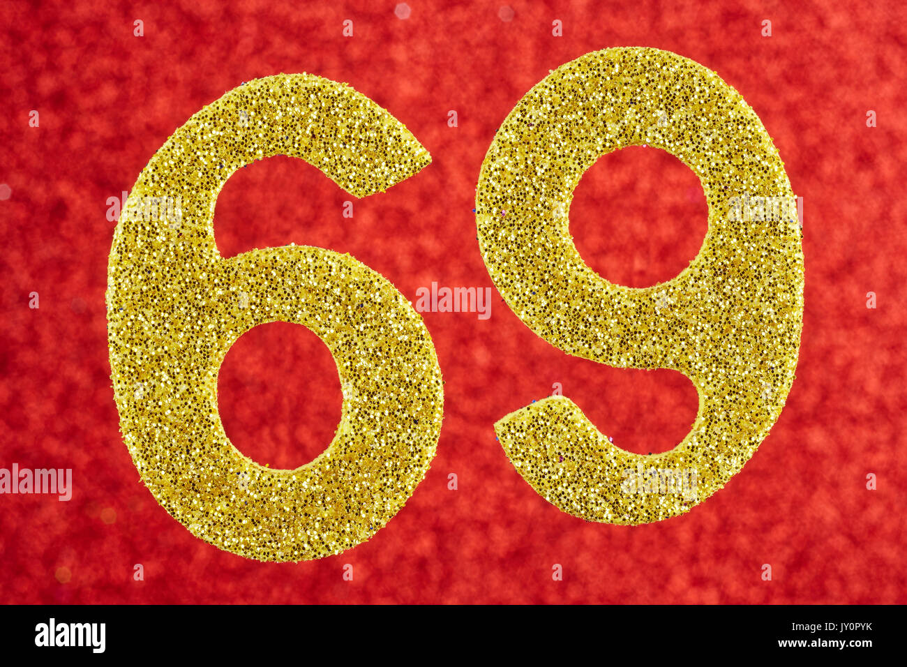Number sixty-nine yellow color over a red background. Anniversary ...