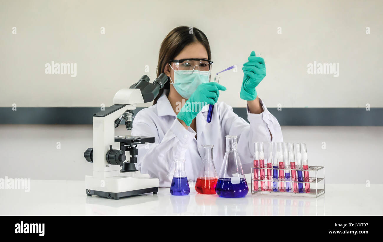 Portrait of Asian scientific researcher working in laboratory Stock ...