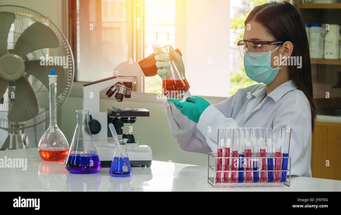Portrait of Asian scientific researcher working in laboratory Stock ...